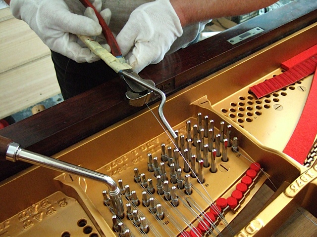 Action repair or replacement and re-stringing – Specialty Pianos