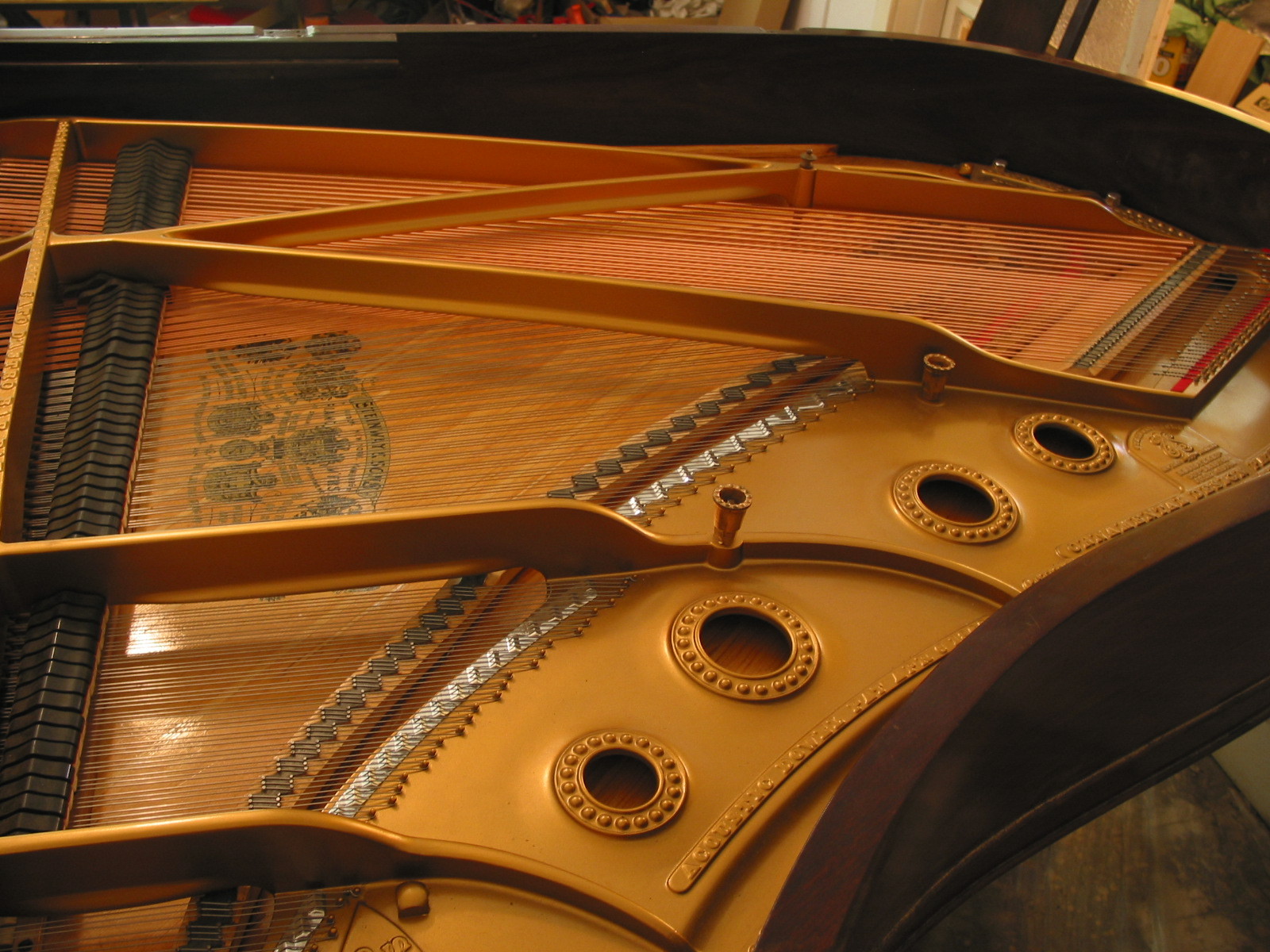 Action repair or replacement and re-stringing – Specialty Pianos
