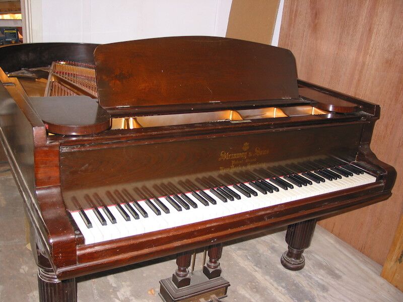 Action repair or replacement and re-stringing – Specialty Pianos